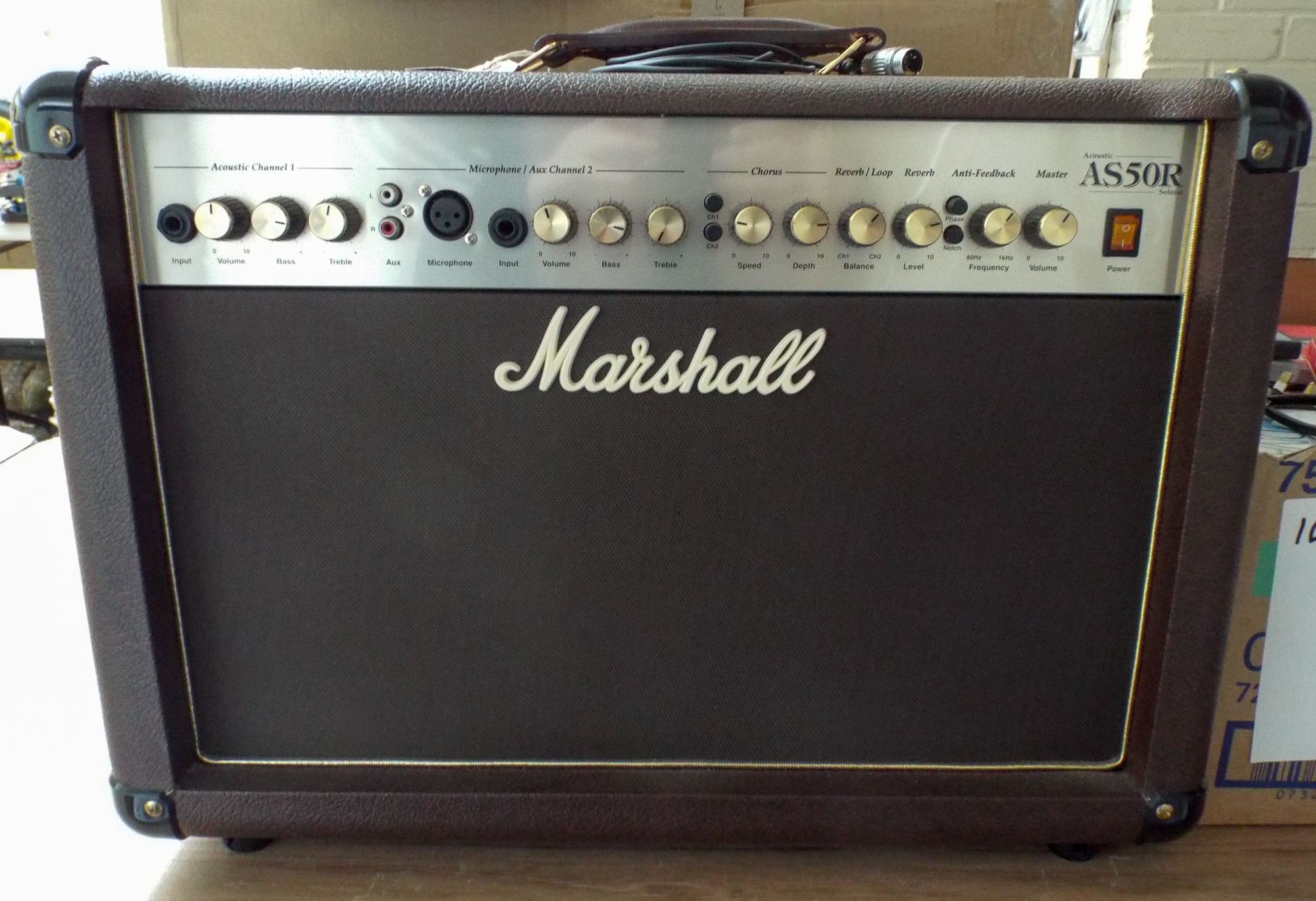 A Marshall acoustic AS50R soloist amplifier in brown case