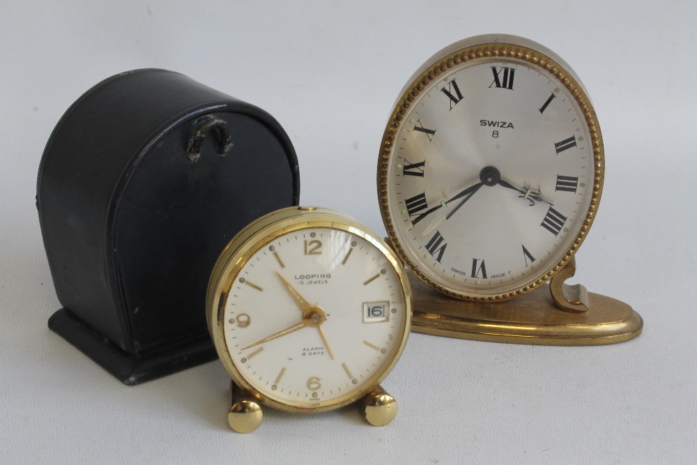 A SMALL VINTAGE "LOOPING, 15 JEWEL" ALARM CLOCK IN CASE, together with ...