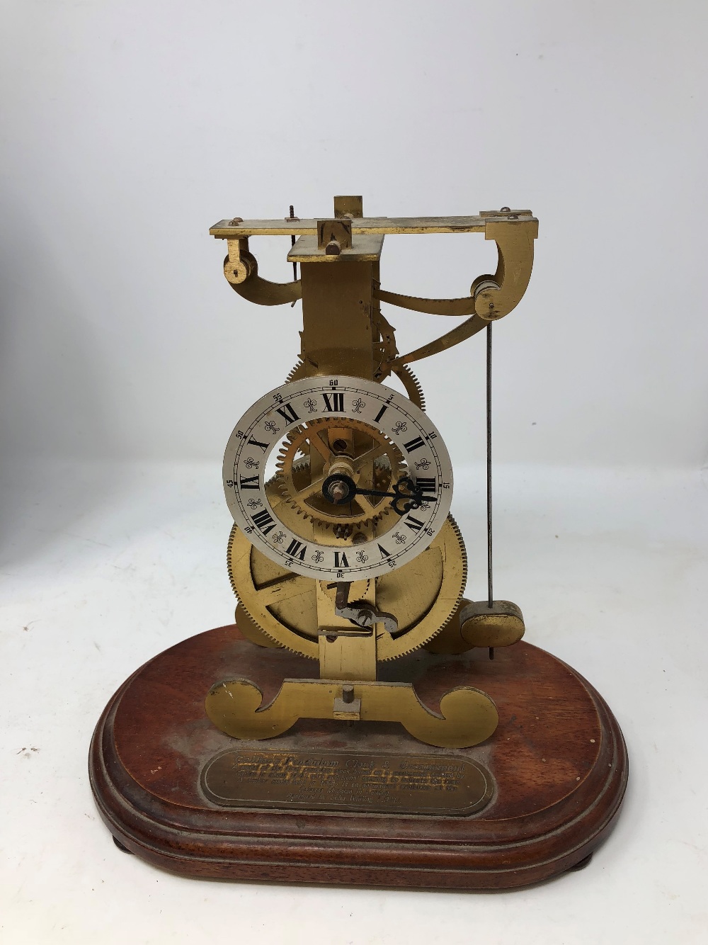 A model of Galileo's pendulum clock and escapement circa 1642. Mounted ...