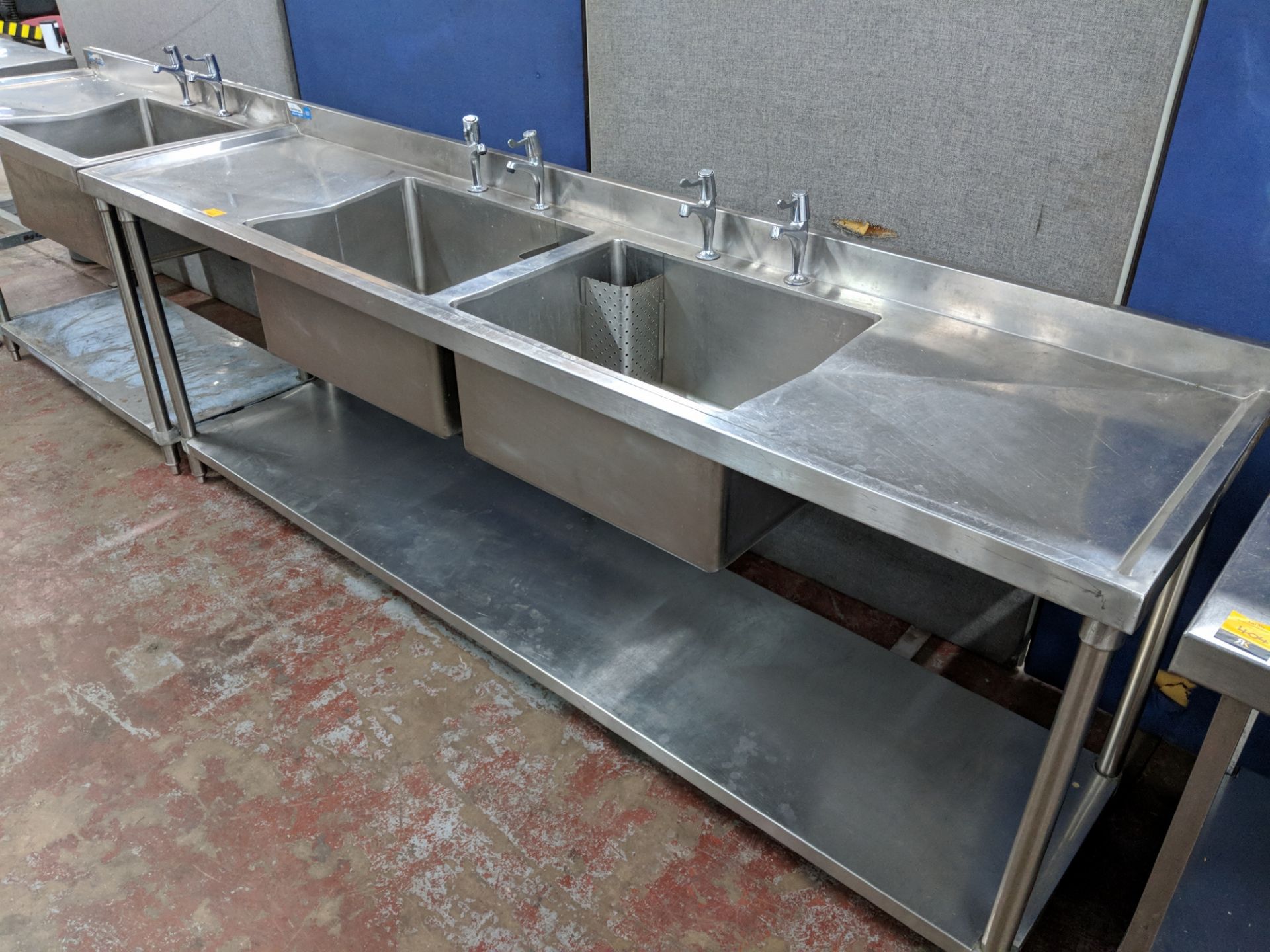 Very large stainless steel twin deep sink arrangement, each sink having ...