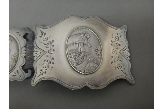 An Edwardian lady's silver waist belt, made from joined pierced and ...