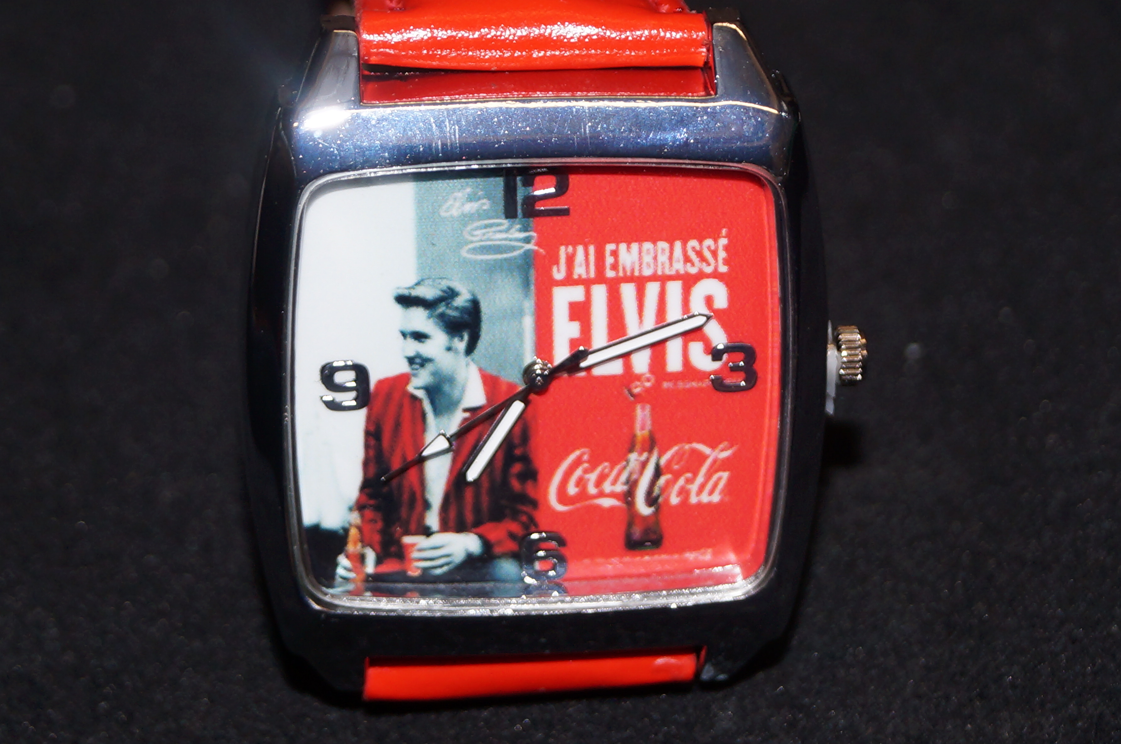 Elvis Presley / coca cola wristwatch with red leather strap
