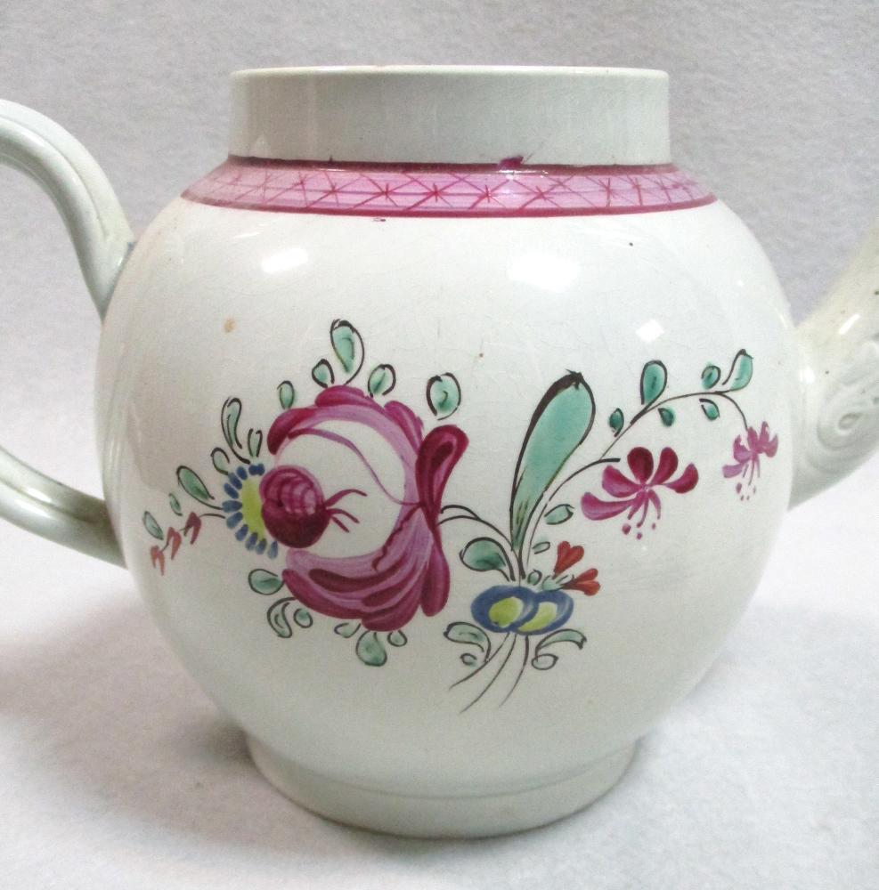 A pearlware teapot and cover, circa 1800, decorated with scattered ...