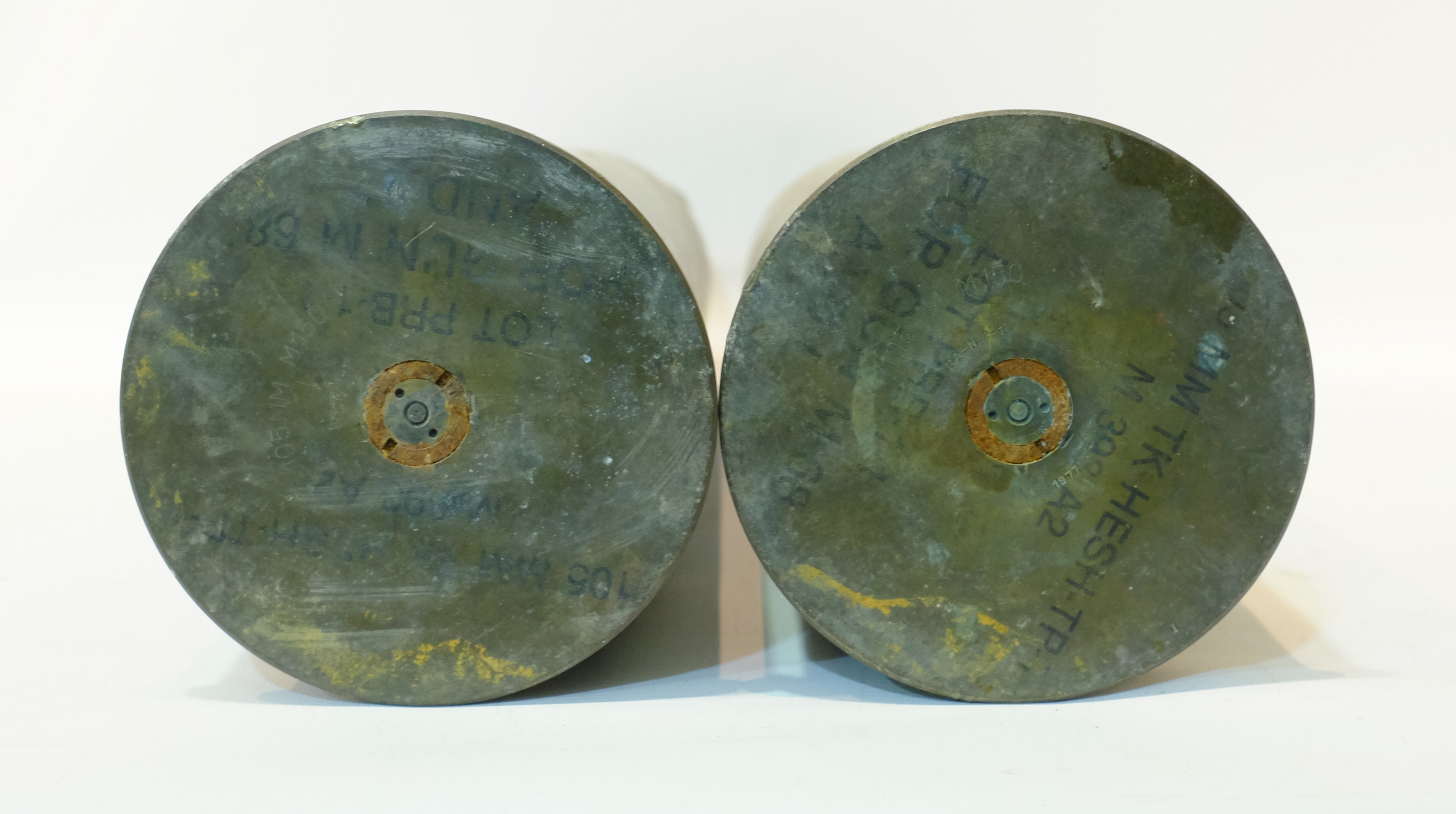 Two brass artillery shells, marked on base 105mm, TK-HESH-TP-TH, M393 ...