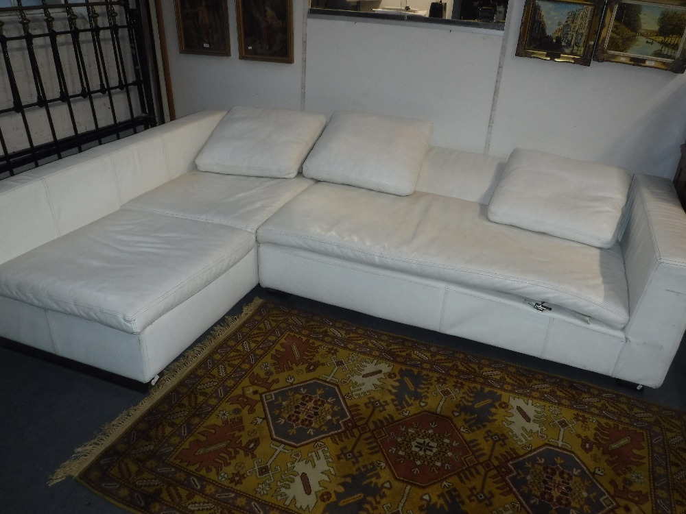GIOVANNI ERBA: An Italian white leather modernist corner sofa, with ...