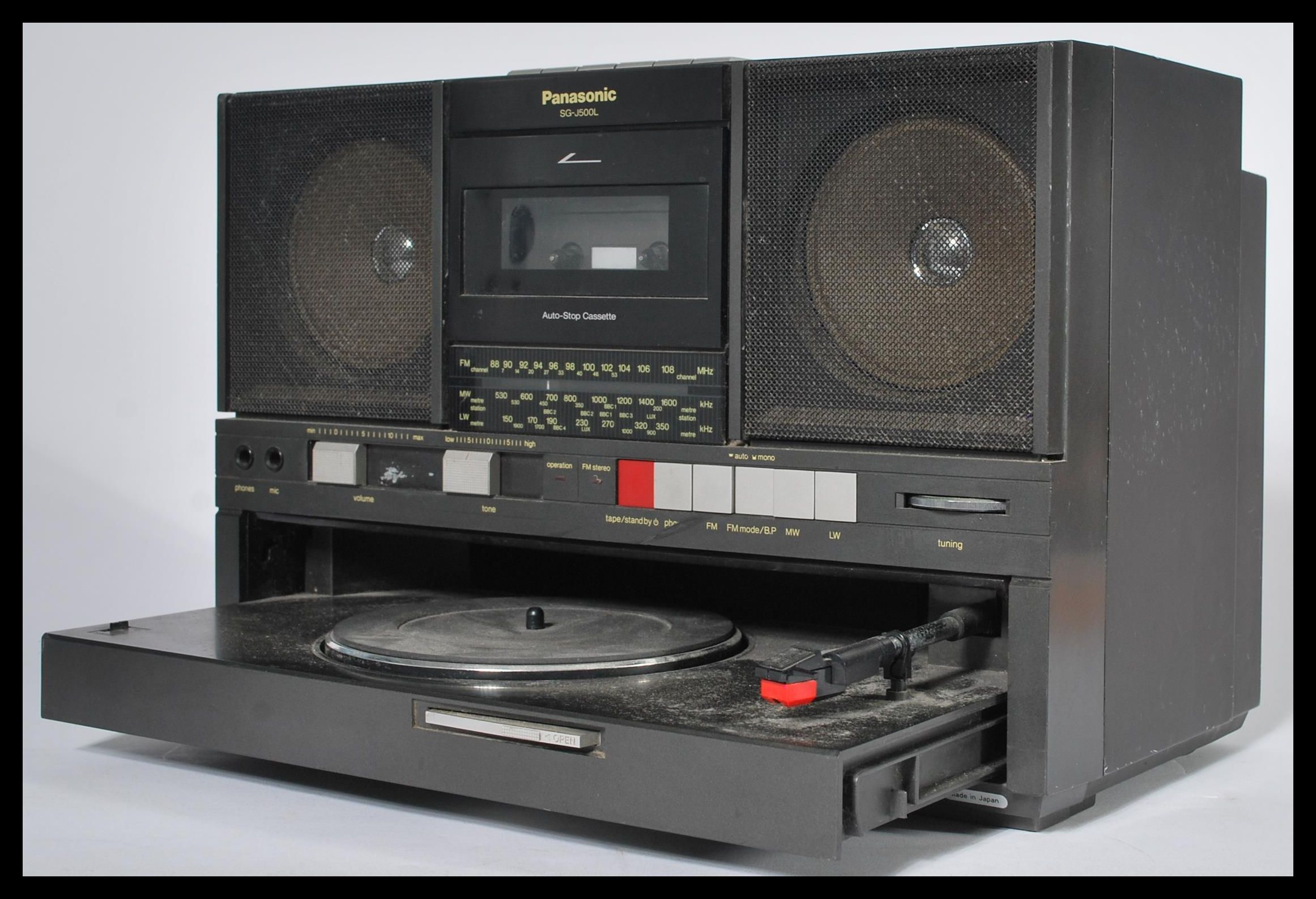 A retro 20th Century Panasonic portable record player, tape player and ...