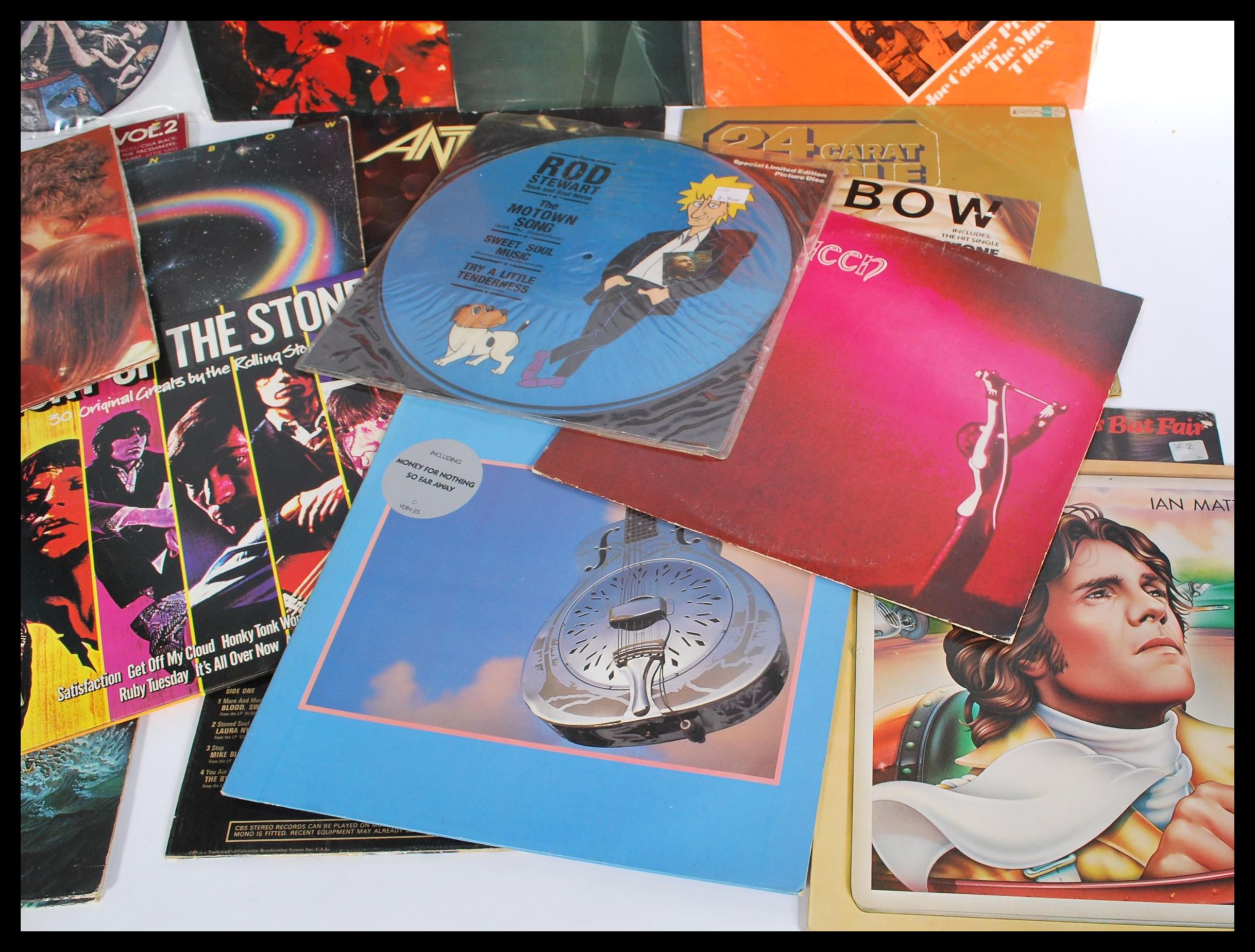 A collection of vinyl long play records featuring several artists to ...