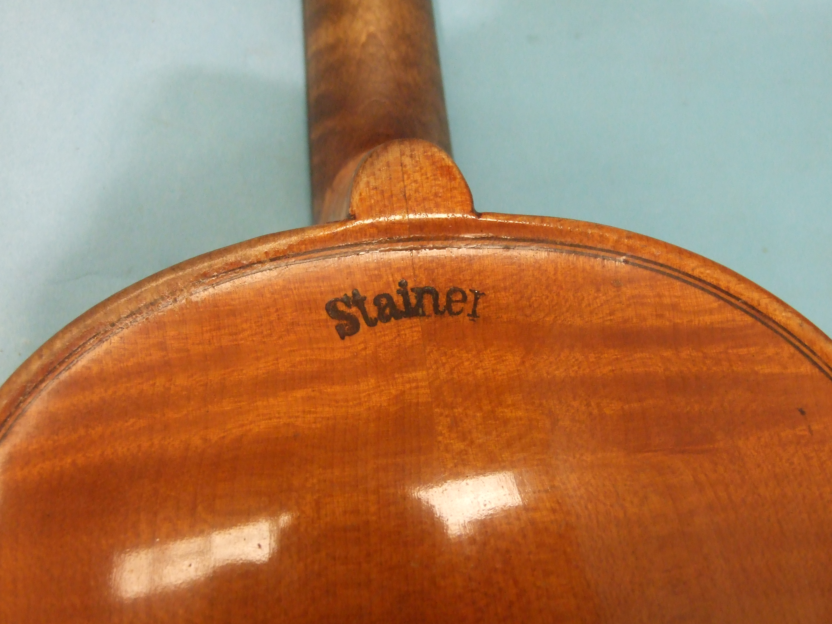 A violin, the two-piece back stamped "Stainer" and measuring 14", 35 ...