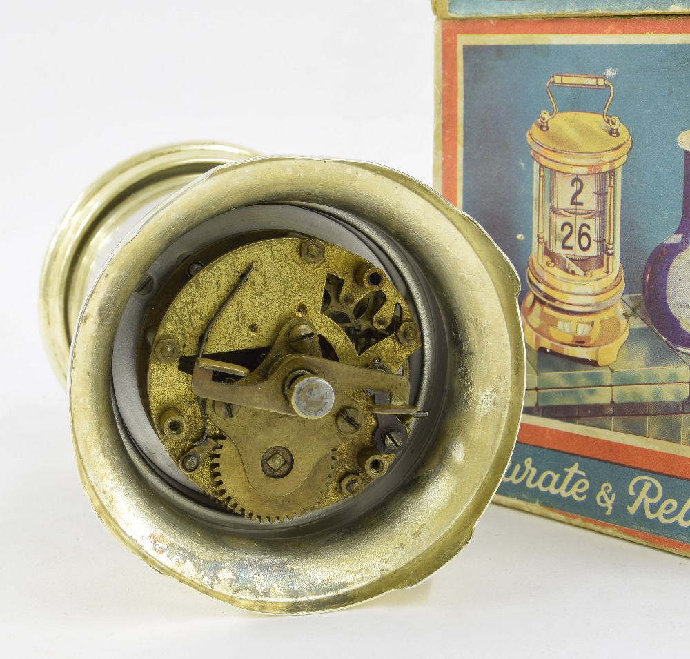 Eveready Chronos cylindrical brass ticket clock, 6.5" high, within the ...