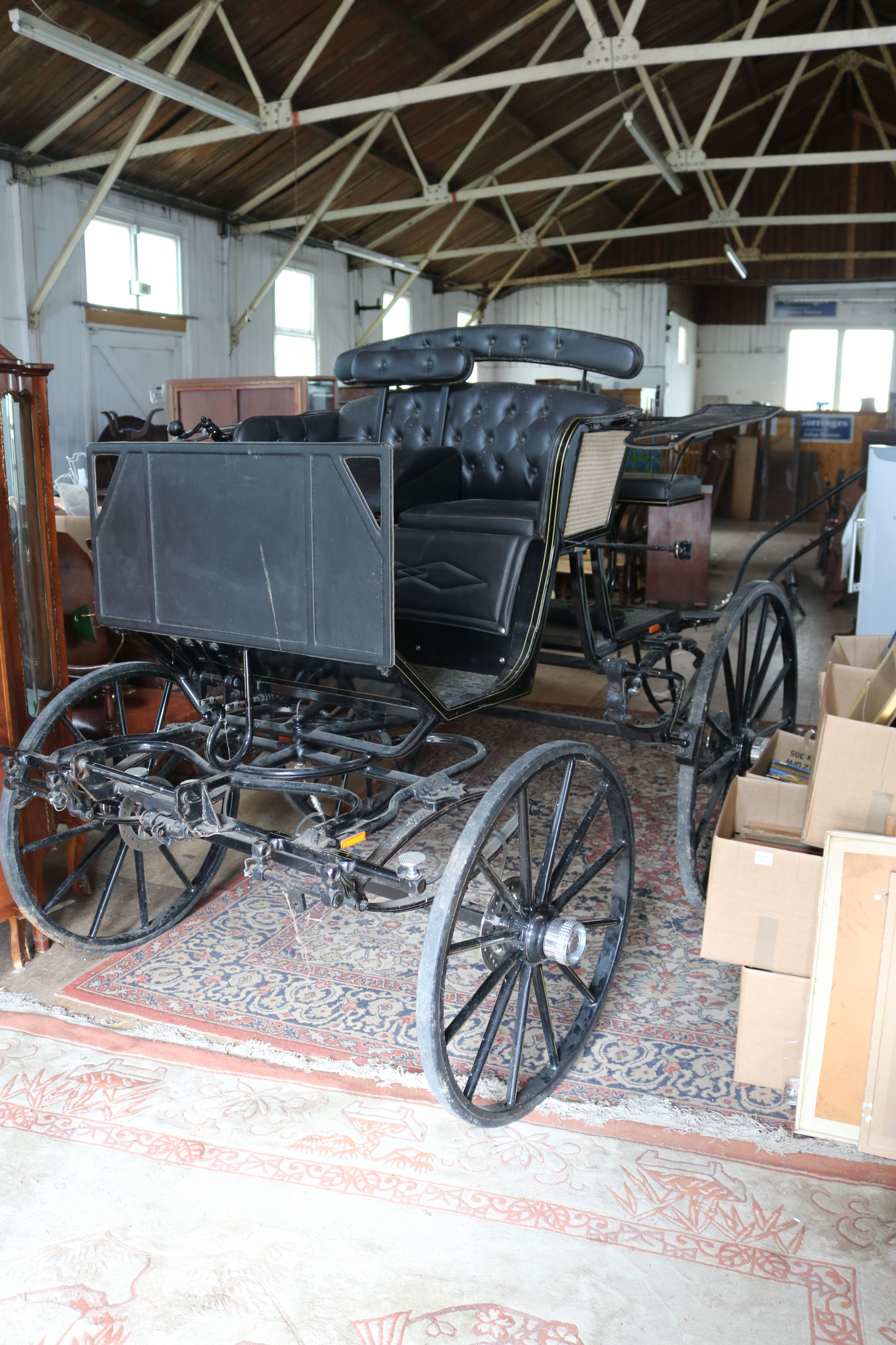 A Hartland Phaeton horse carriage