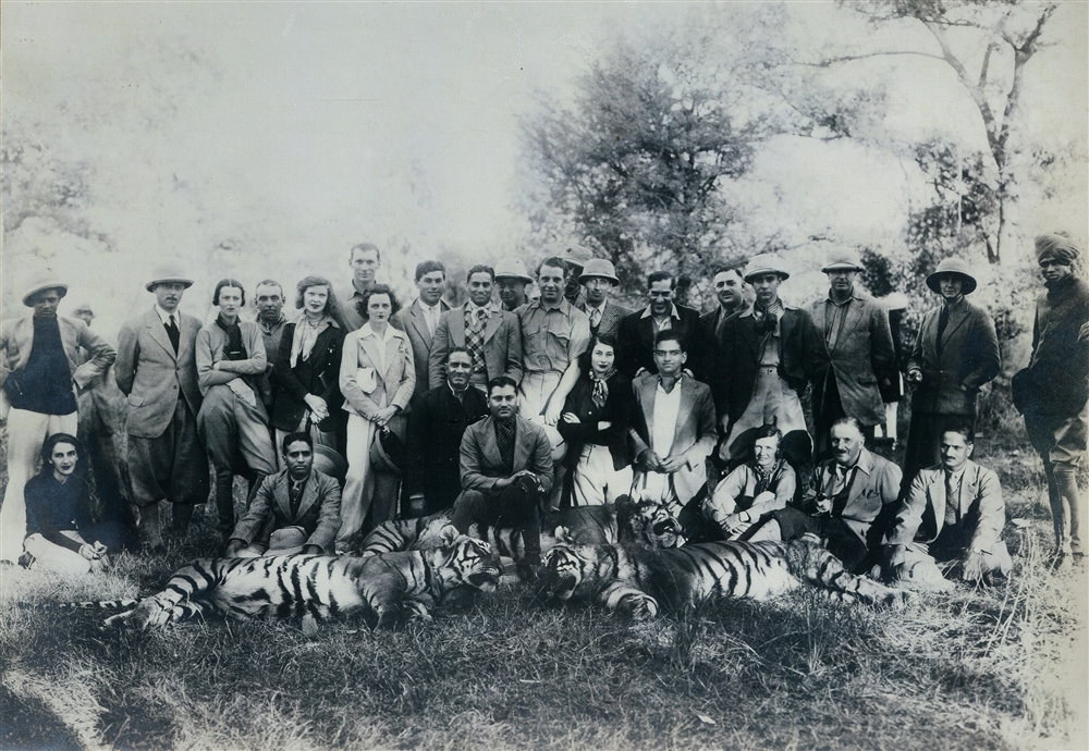 A PHOTOGRAPH OF THE END OF A TIGER HUNT with hunting party with three ...
