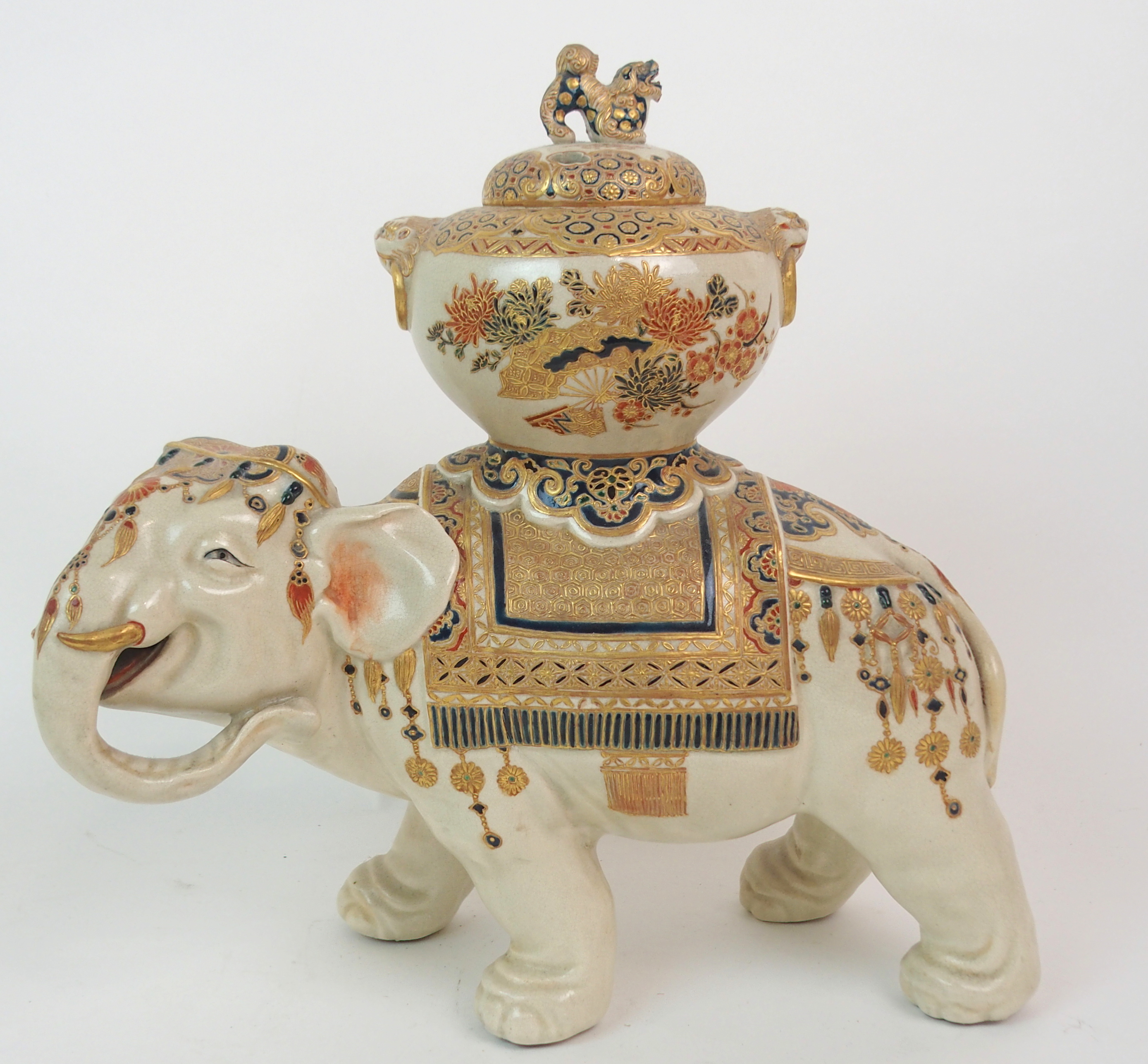 A SATSUMA ELEPHANT CENSER the vase applied with shishi finial above ...