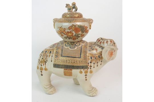 A SATSUMA ELEPHANT CENSER the vase applied with shishi finial above ...