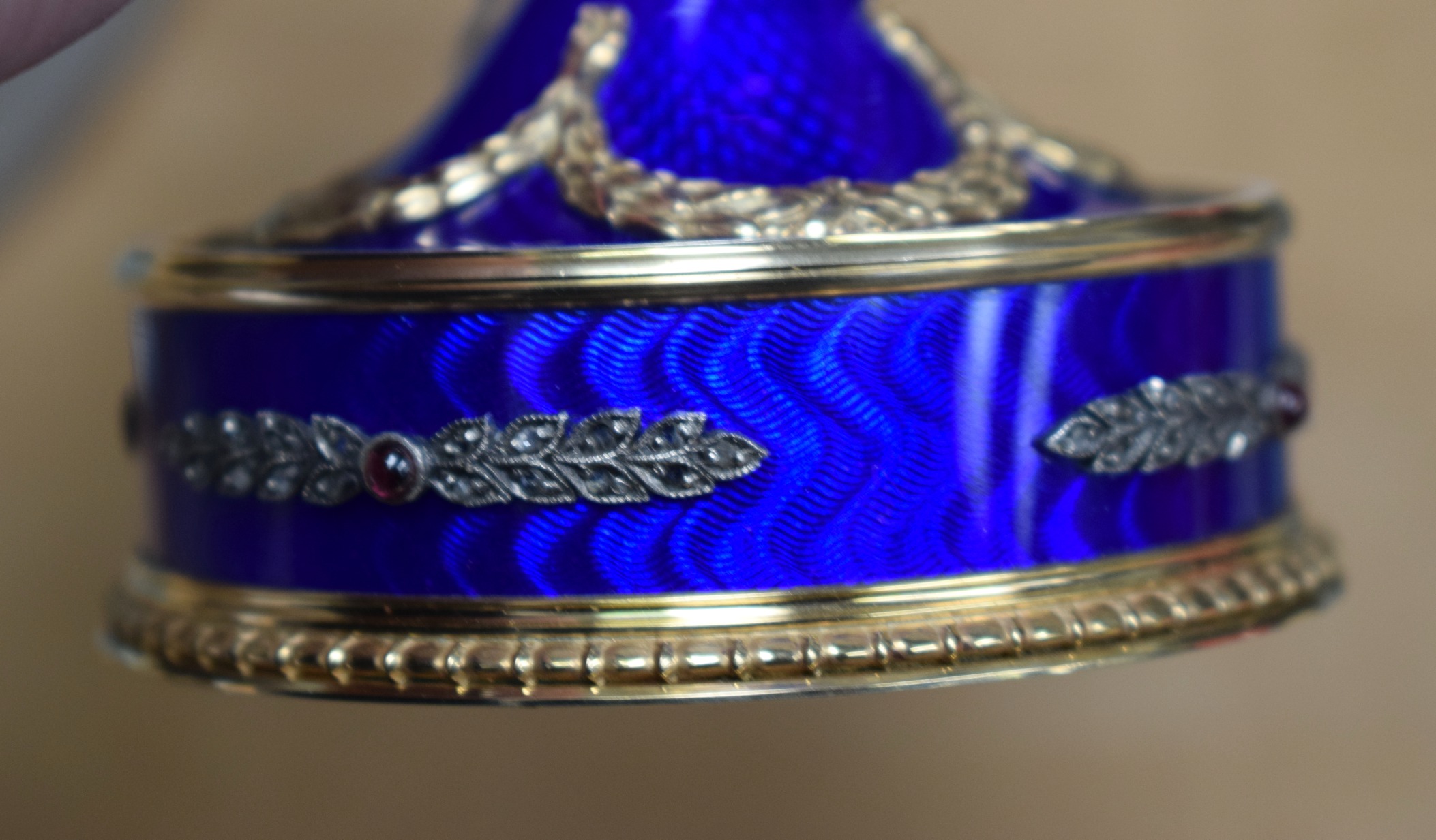 A FINE RUSSIAN SILVER GILT AND BLUE ENAMEL MANTEL CLOCK the egg shaped ...