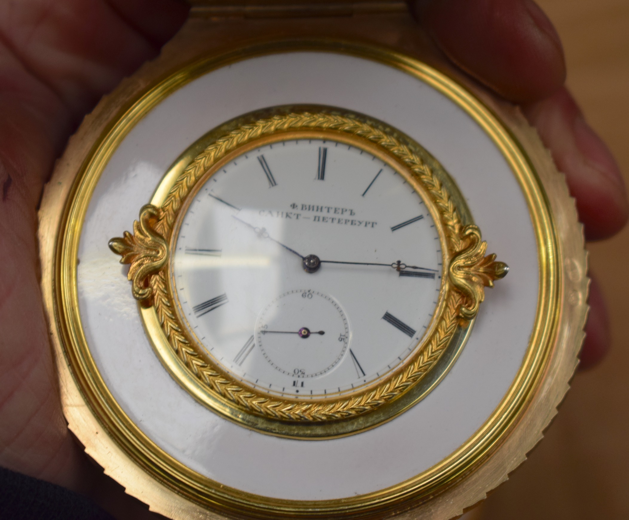 A FINE RUSSIAN SILVER GILT AND BLUE ENAMEL MANTEL CLOCK the egg shaped ...