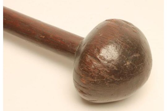A ZULU KNOBKERRIE OR THROWING CLUB, late 19th century, of typical form ...