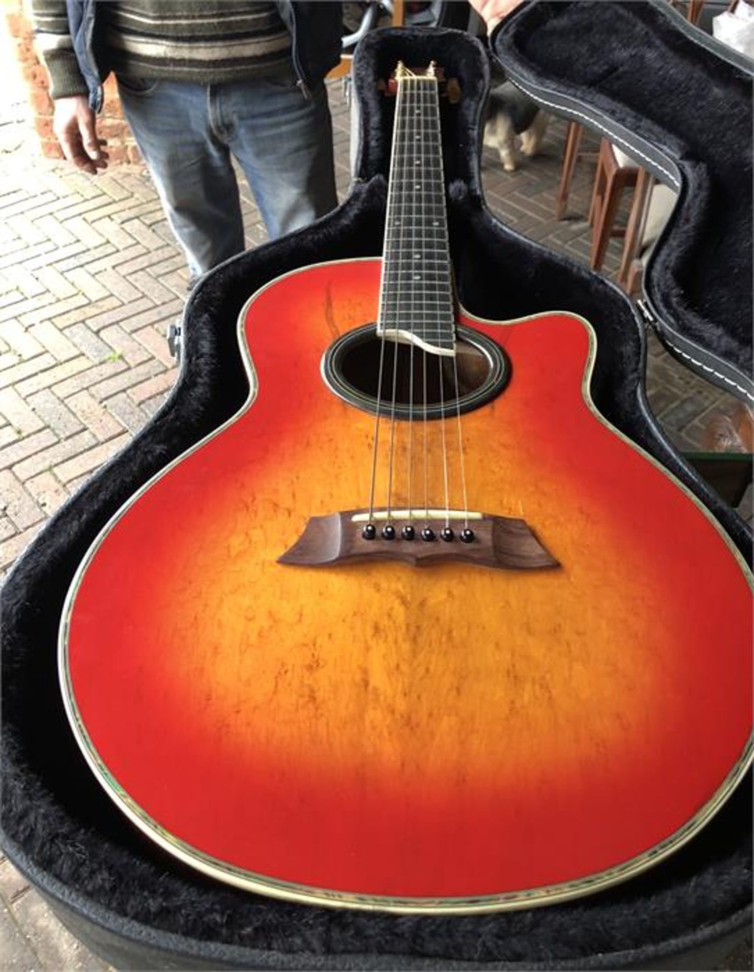 A Jim Deacon Guitar and case