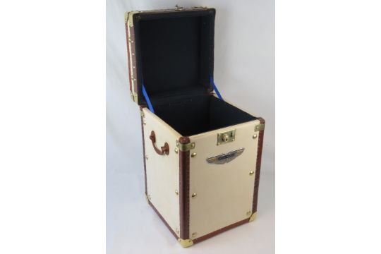A single Army and Navy type cream leather lidded trunk with brown ...