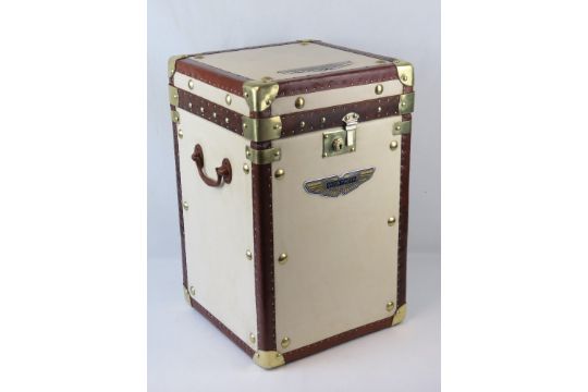 A single Army and Navy type cream leather lidded trunk with brown ...