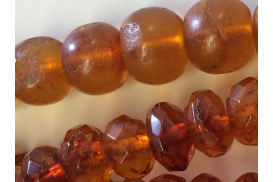 Chinese amber necklace designed as two rows of graduated faceted beads ...