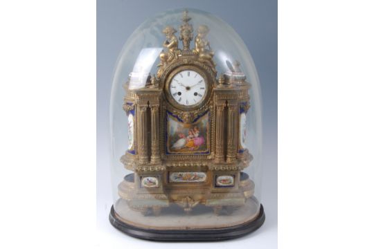 A 19th century French gilt bronze mantel clock under glass dome, the ...