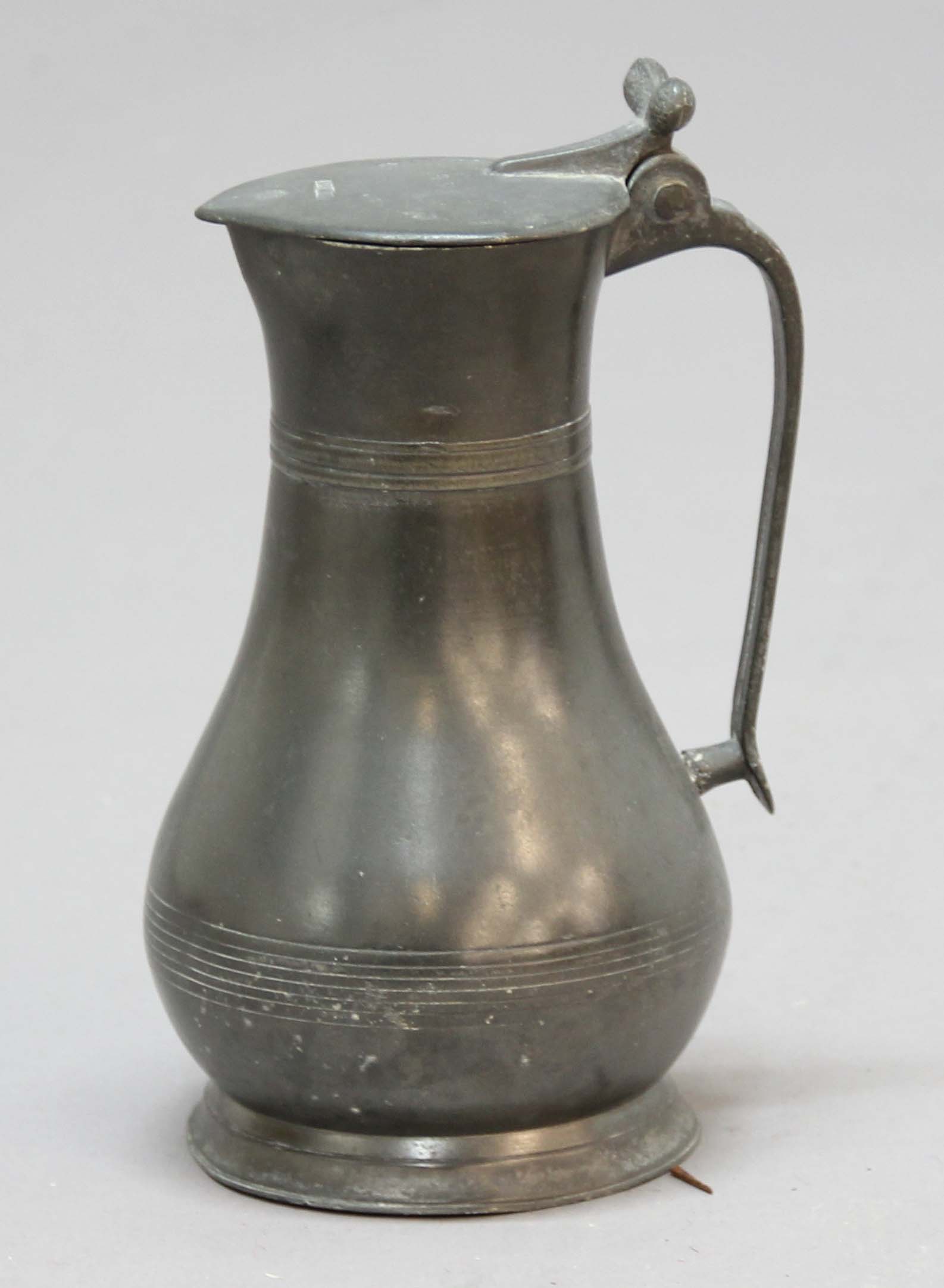 GUERNSEY PEWTER TYPE 1 FLAGON, 18th century, of lidded baluster form ...