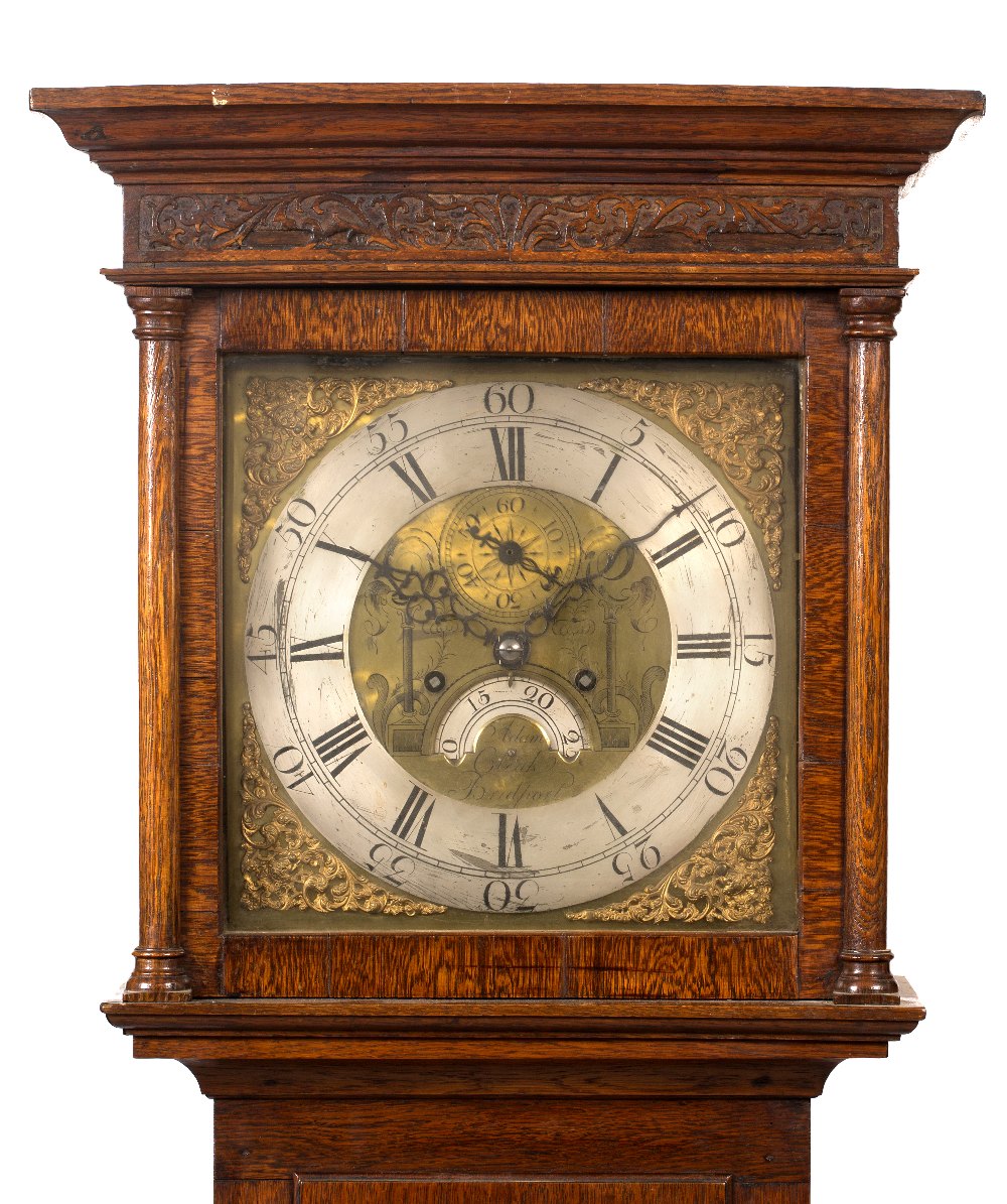 ADAM CLEAK, BRIDPORT An oak eight day longcase clock, the 12" square ...