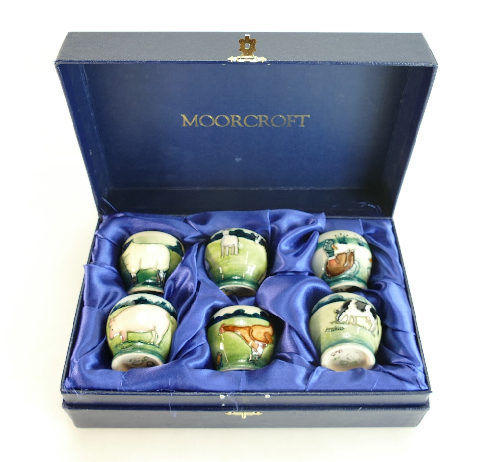 Moorcroft set of 6 egg cups decorated with various farm animals and ...