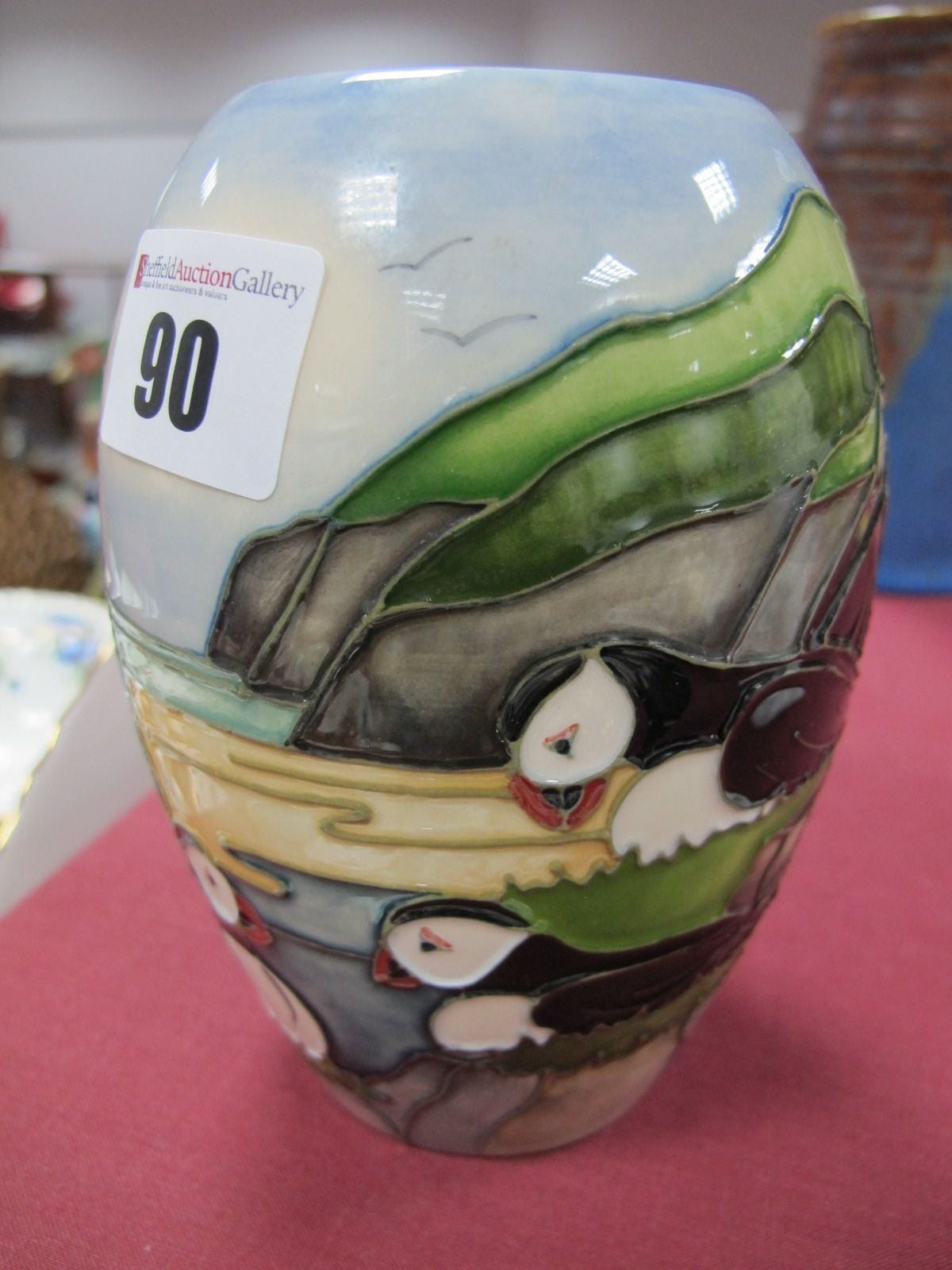 A Moorcroft Pottery Puffin Vase, 'KDM', 'Kerri' and date 97 under base ...