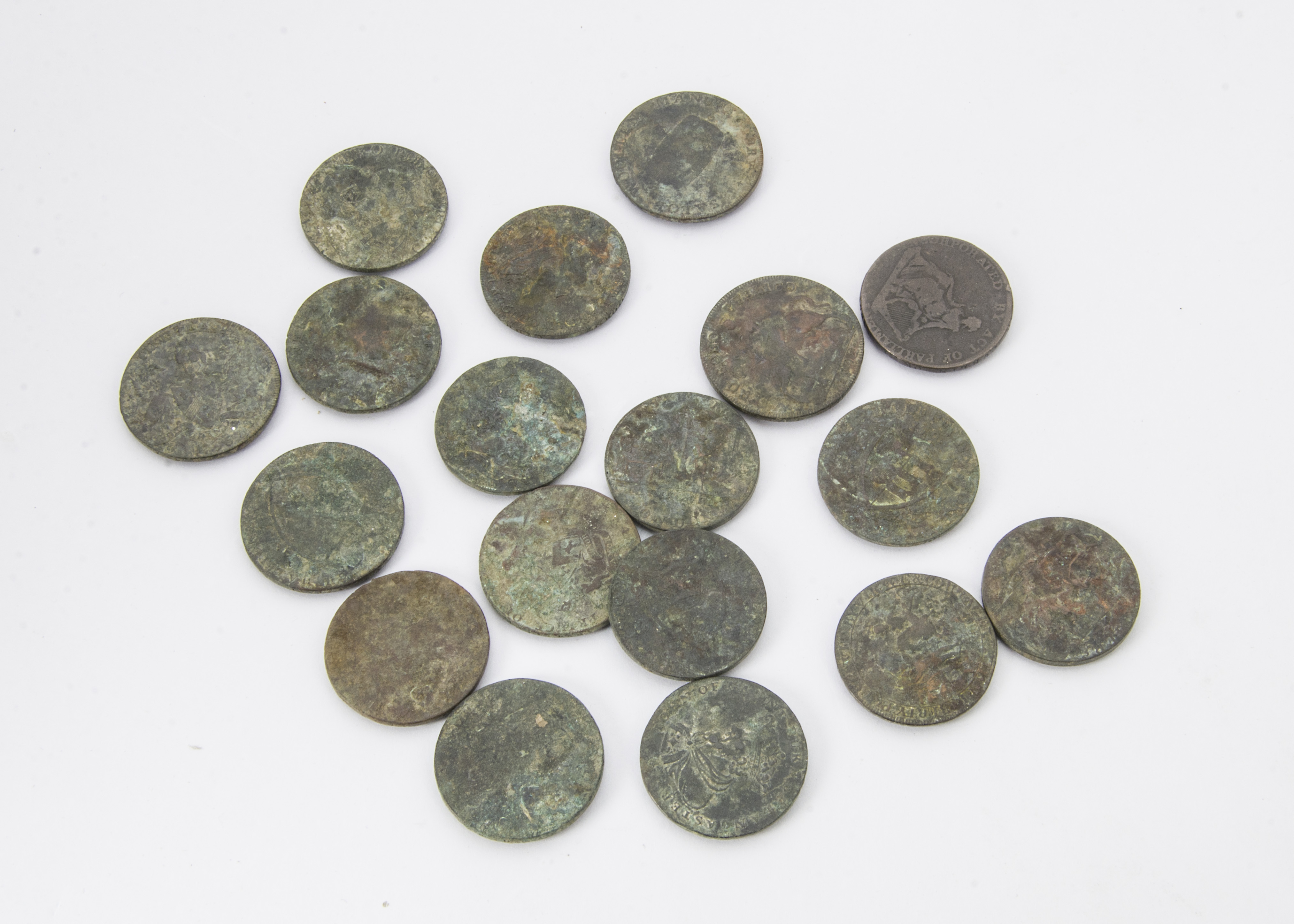 A collection of 18 Georgian copper half penny tokens, including a 1792 ...