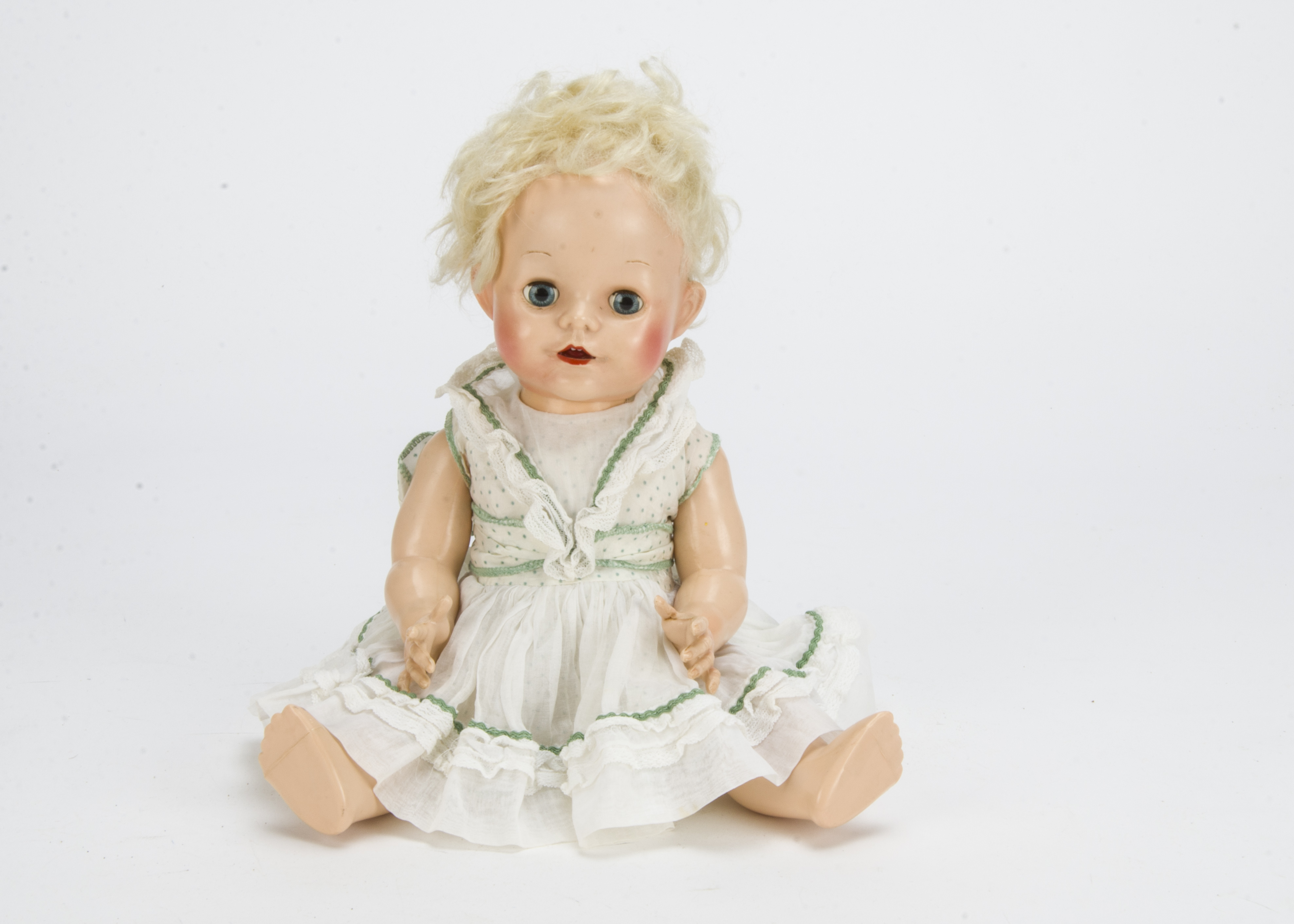 A Pedigree hard plastic Princess Anne doll, In Norman Hartnell dress ...