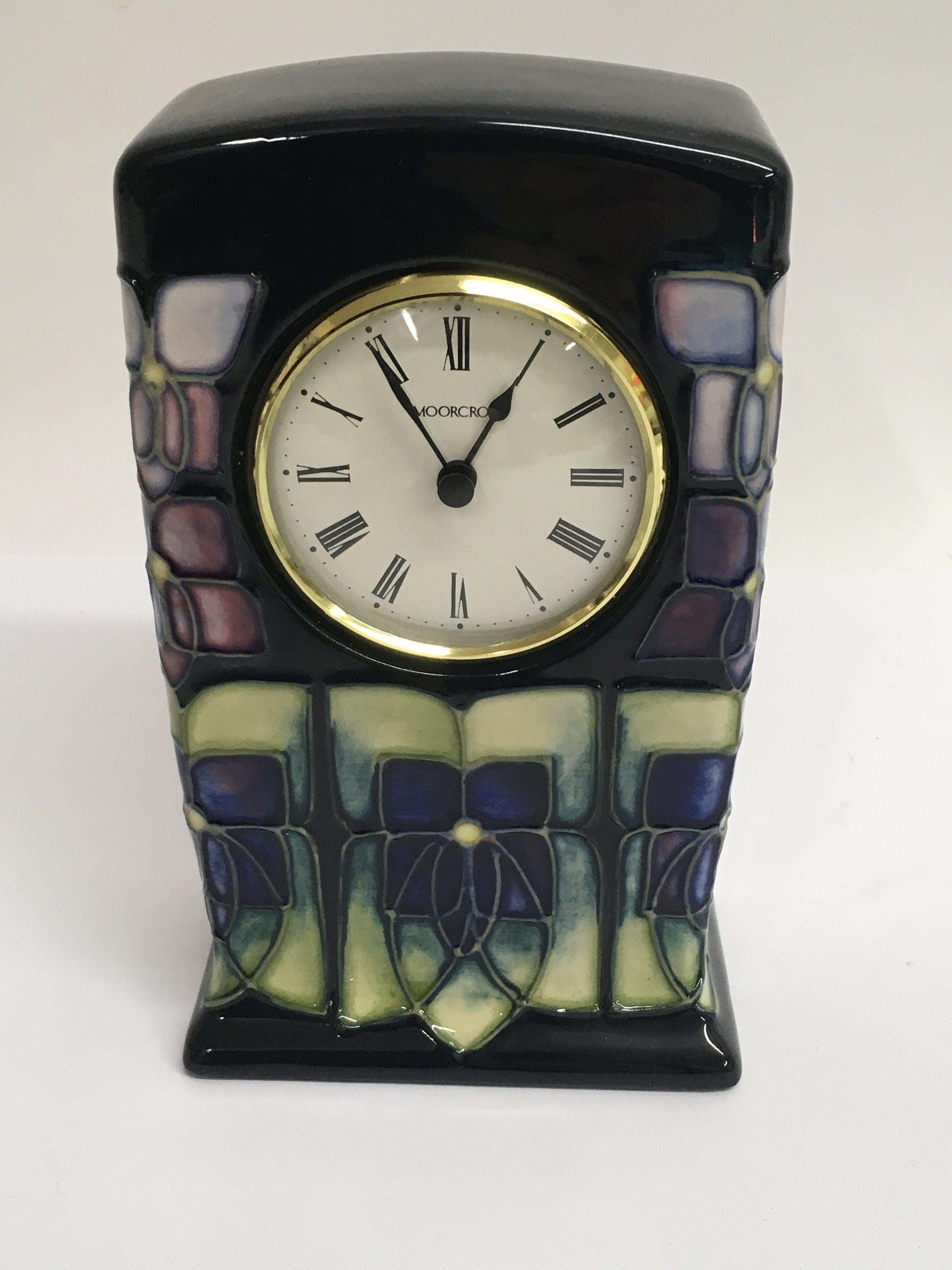 A modern Moorcroft clock decorated in the Art Nouveau style.Approx 16cm ...
