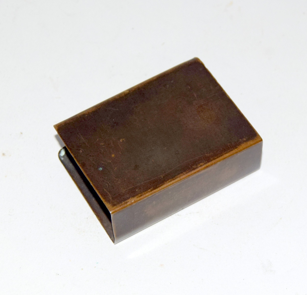 A WW1 brass matchbox cover having in raised relief Farewell from the ...