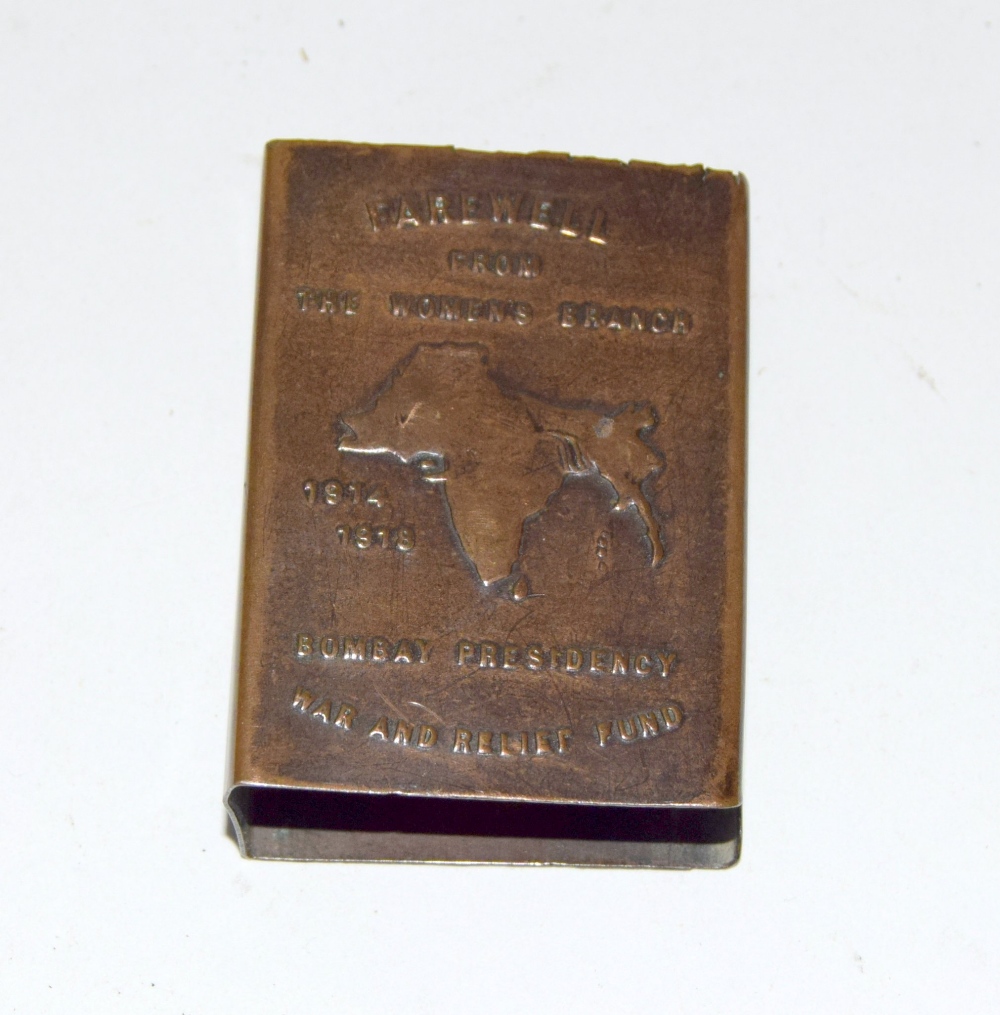 A WW1 brass matchbox cover having in raised relief Farewell from the ...