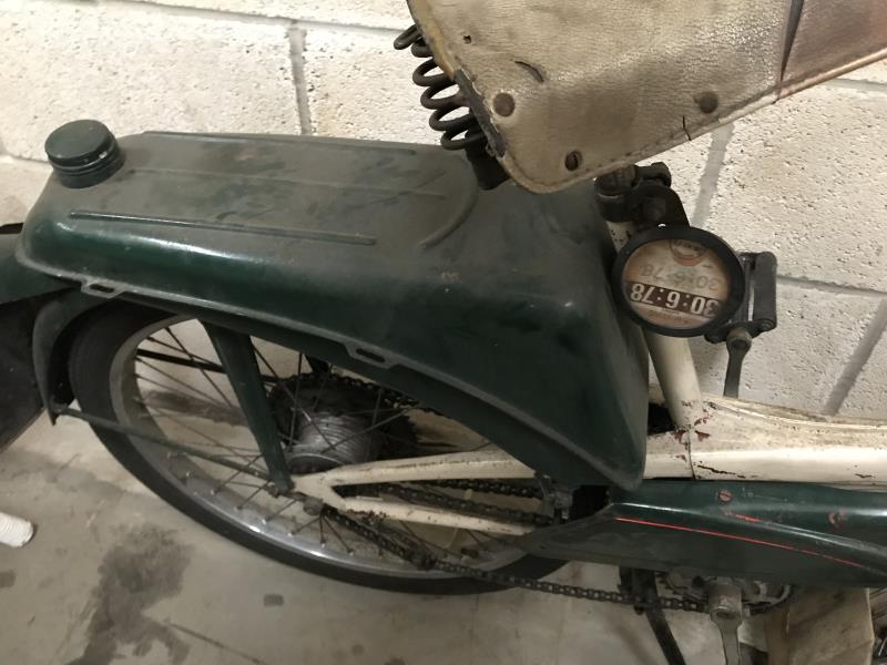 A 1966 Raleigh runabout moped (no documents).