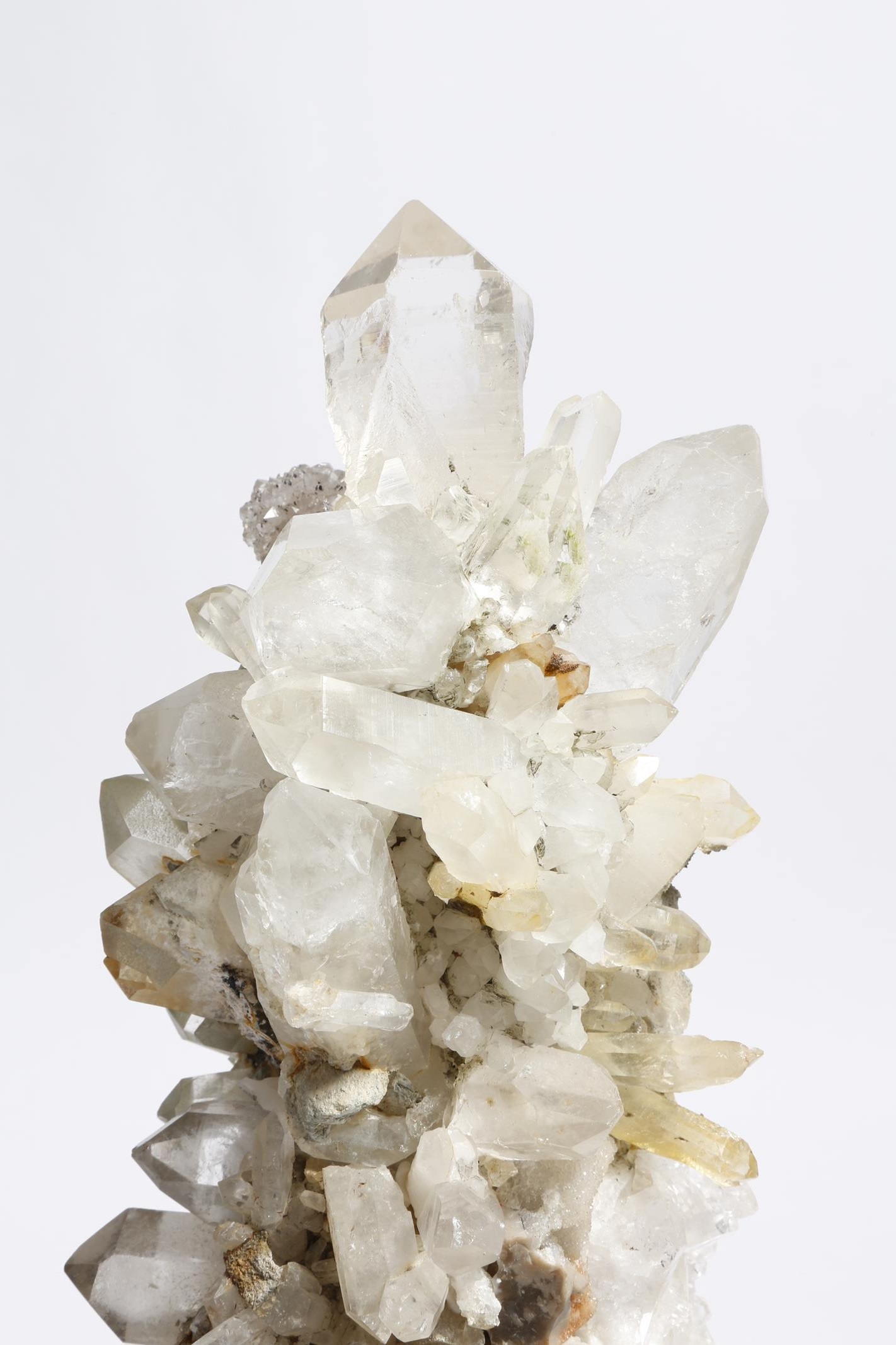 A Victorian quartz crystal specimen group, on an ebonised base, applied ...