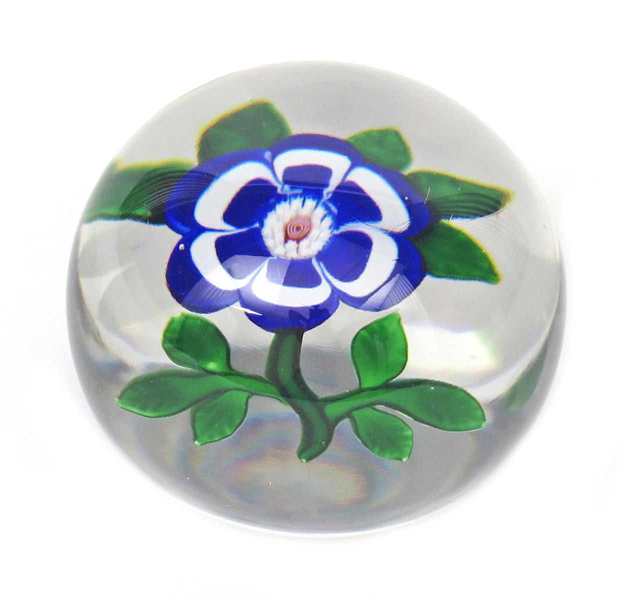 A large Baccarat flower paperweight c.1850, set with a primrose with ...