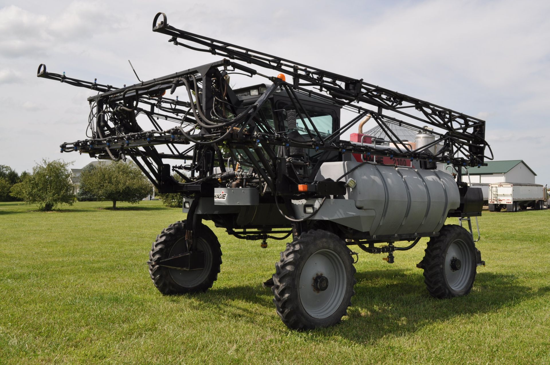 Hagie 2100 sprayer, (2) 500 gal poly tanks, front 90' boom, 20" spacing ...
