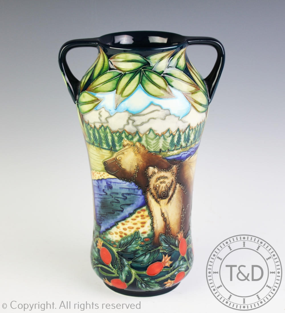 A limited edition Moorcroft twin handled vase, designed by Sian Leeper ...