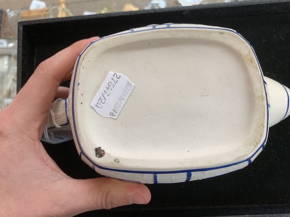 CASTLEFORD; a circa 1790 creamware teapot modelled as a cottage with ...
