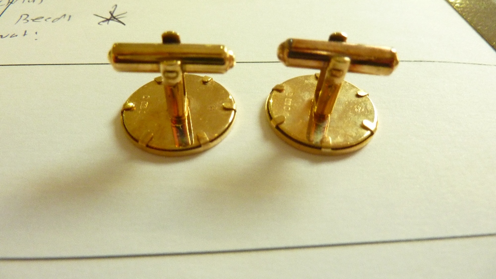 A pair of George V half sovereign cufflinks, 1911 and 1915, in 9ct ...