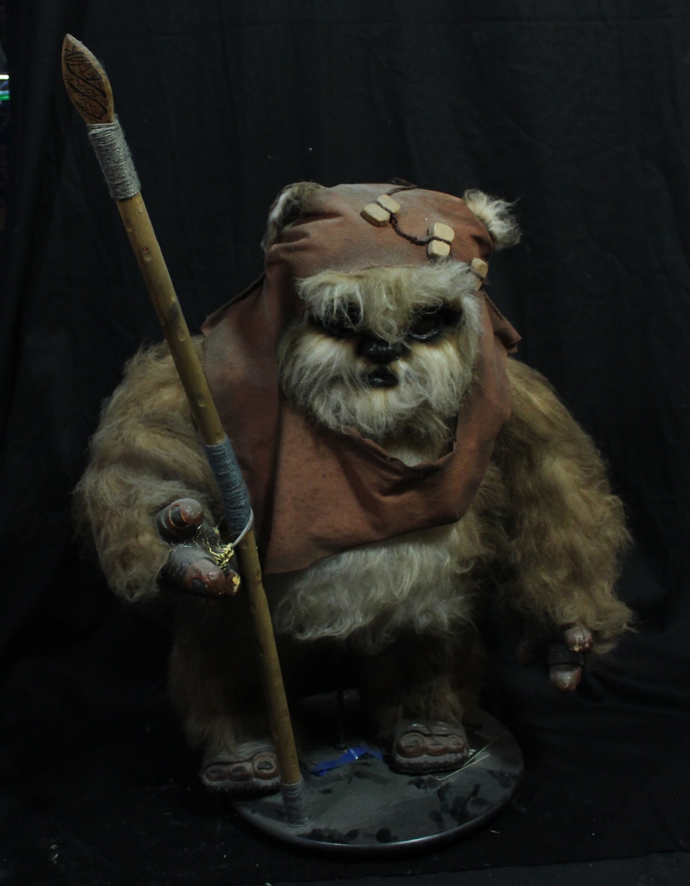 STAR WARS; an Ewok figure, height including circular stand (excluding ...