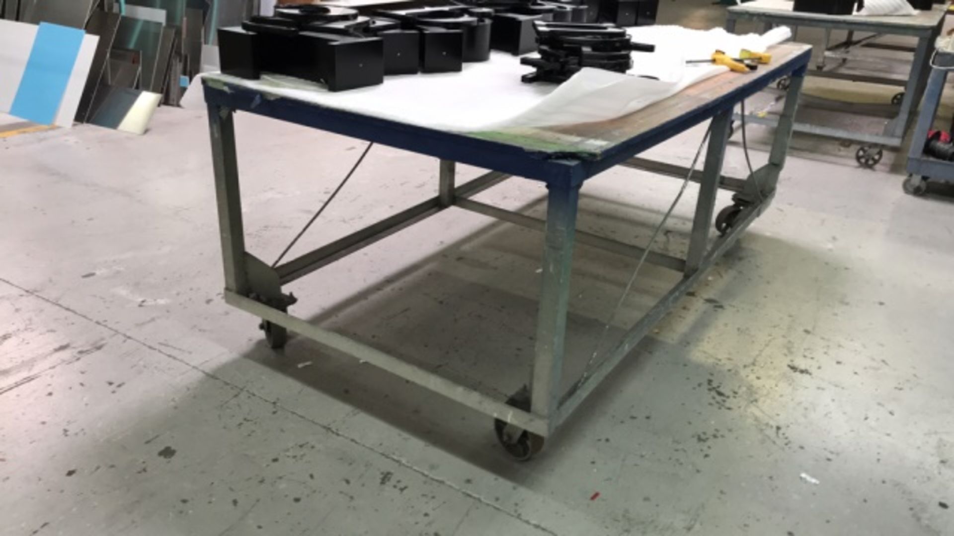 14 Assorted rolling shop tables