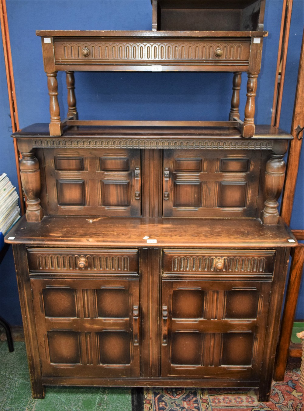 A Priory style court cupboard; a similar telephone table/seat (2)
