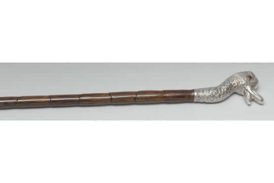 A late Victorian novelty silver-mounted walking cane, by Brigg of ...