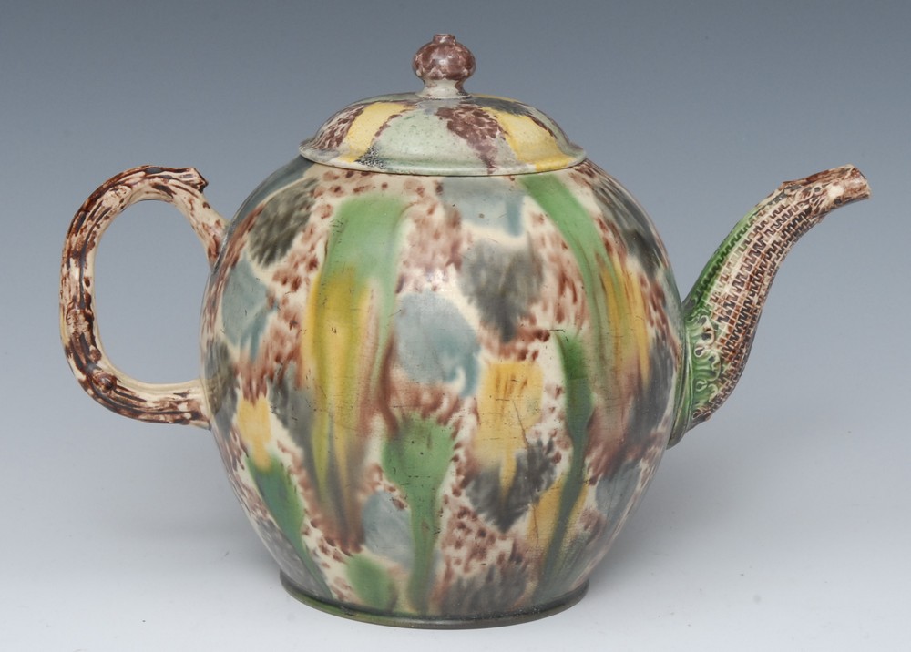 A Whieldon globular teapot, dripped and splashed in green, yellow and ...