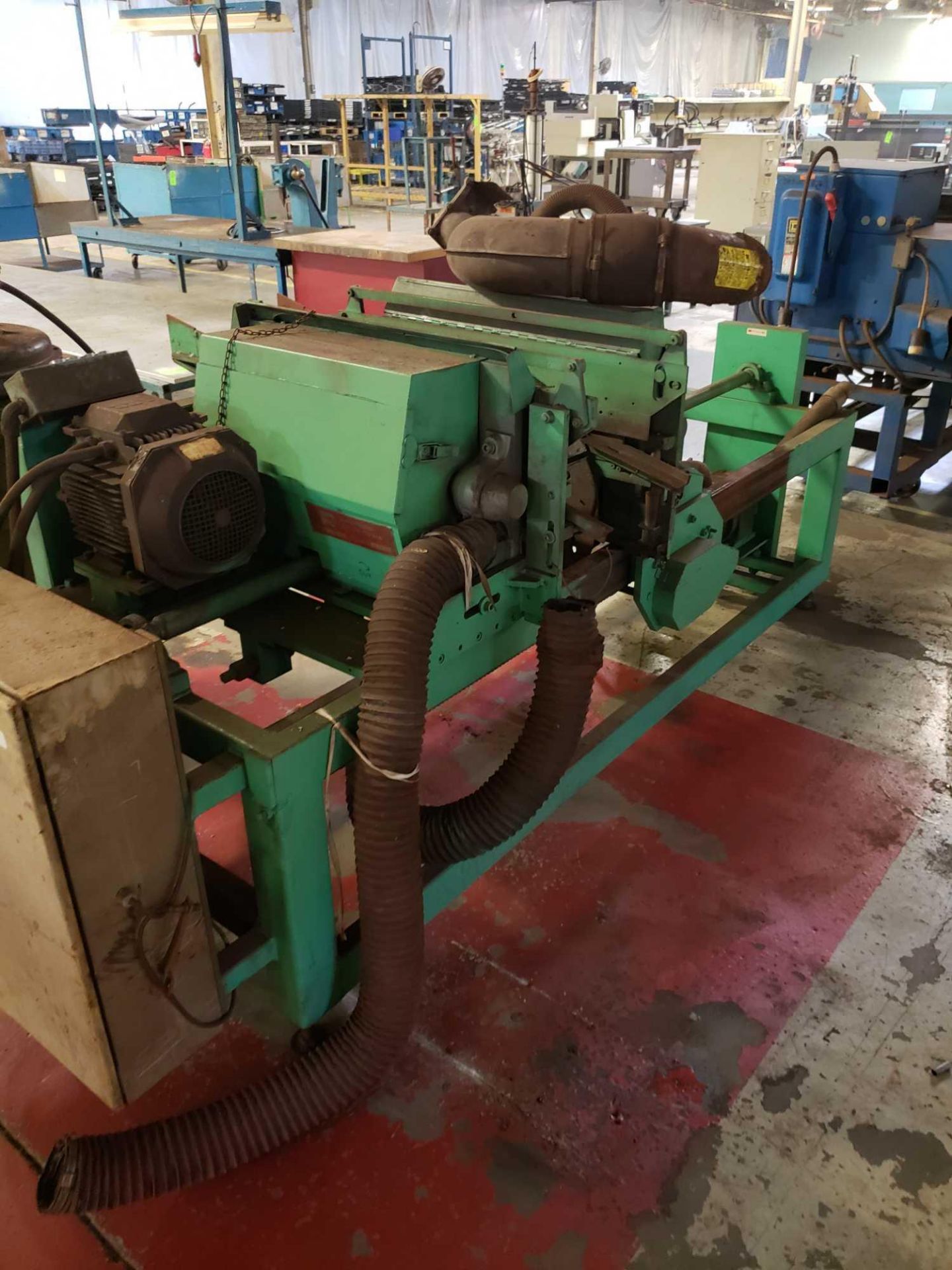 Burrmaster double end tube deburring machine.