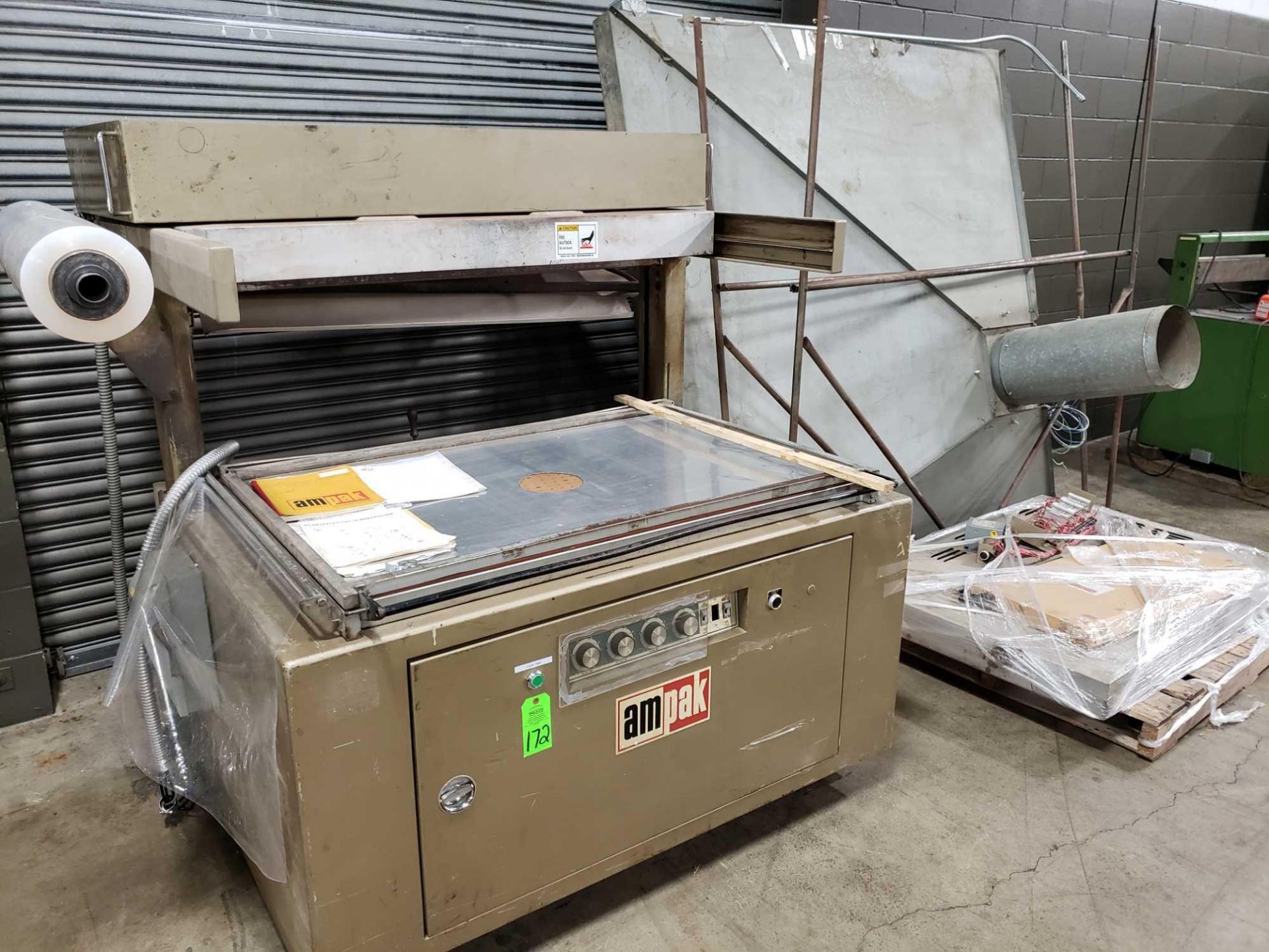 AmPak model A-4800 skin packaging shrink film machine with vented hood ...