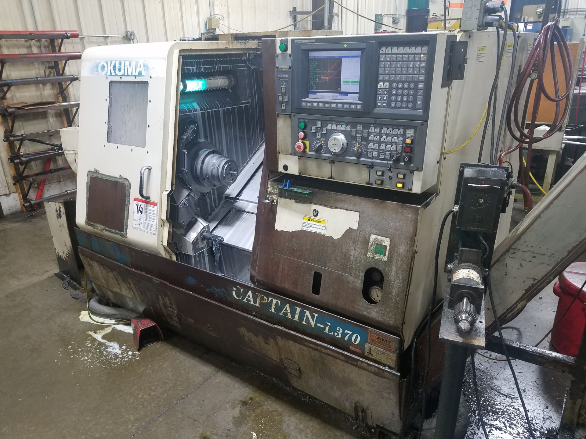 Okuma Captain L370 CNC Turning Center, s/n 0019, OSP-E100L CNC Control ...