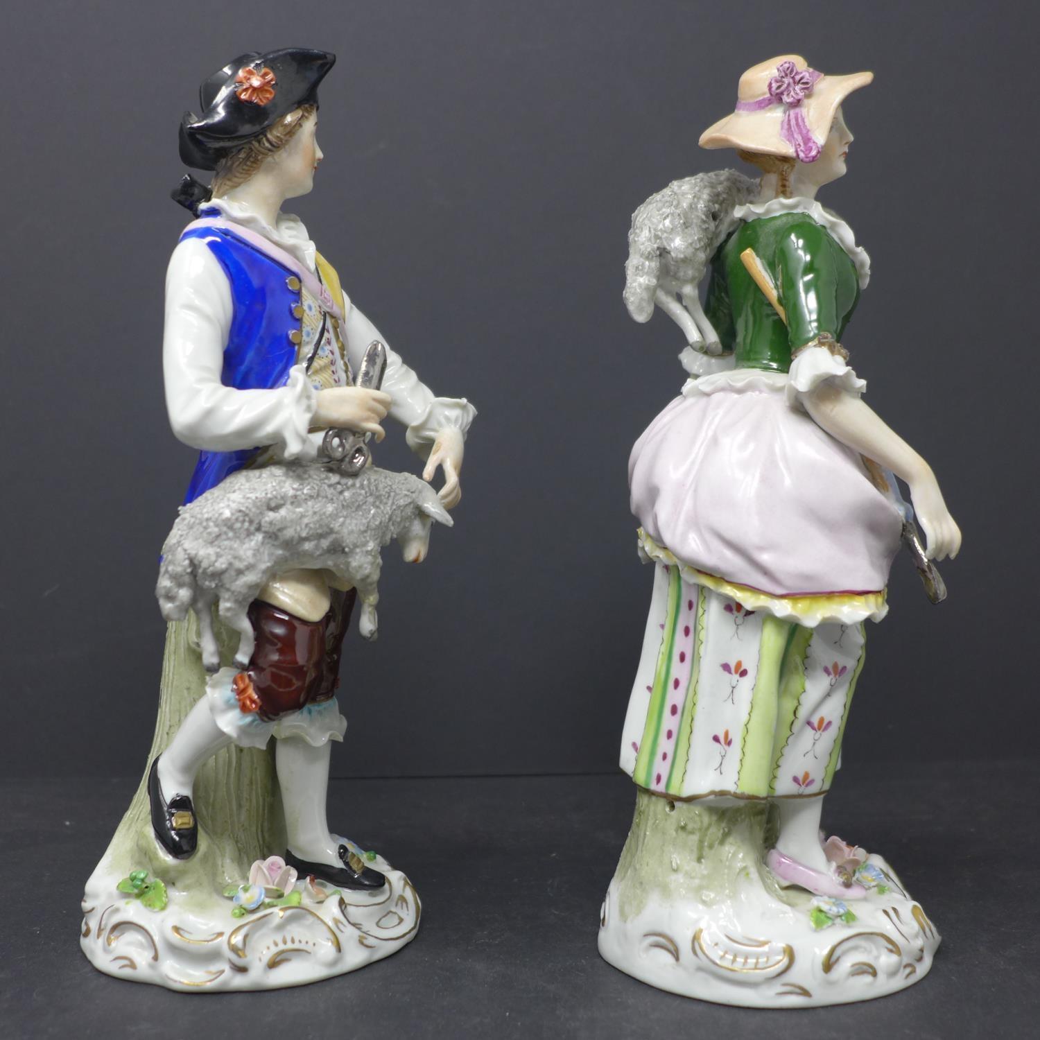 Pair of Sitzendorf porcelain figures, a Shepard and a Shepherdess, 1950's